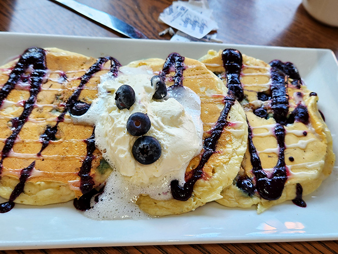 These blueberry pancakes aren't just breakfast &ndash; they're what clouds would taste like if they were made of butter and happiness.