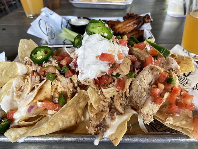 Loaded nachos that laugh in the face of restraint. When chips meet smoked meat and fresh toppings, magic happens on every layer.
