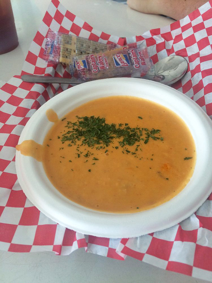 Lobster bisque that whispers of ocean depths&mdash;velvety, rich, and garnished with enough fresh herbs to make you momentarily forget about dessert.