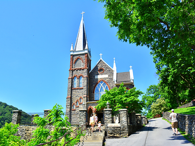 This stone church reaches skyward like a Gothic postcard, its steeple playing hide-and-seek with the clouds above Harpers Ferry.