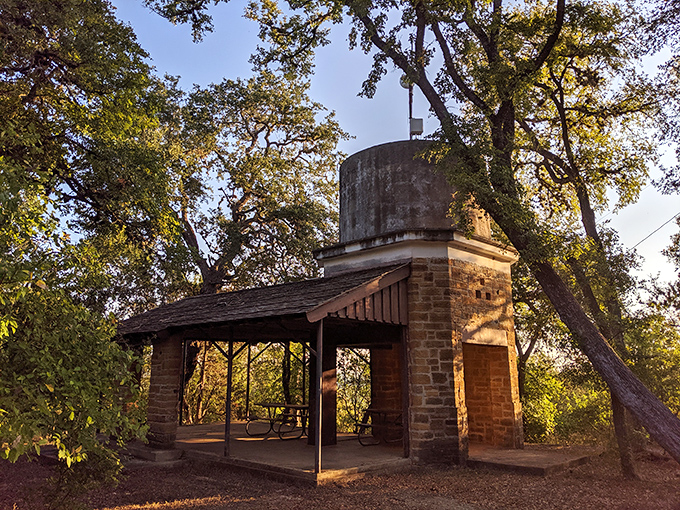 At Lockhart State Park, this stone structure whispers tales of 1930s craftsmanship while offering shade that feels like salvation during Texas summers.