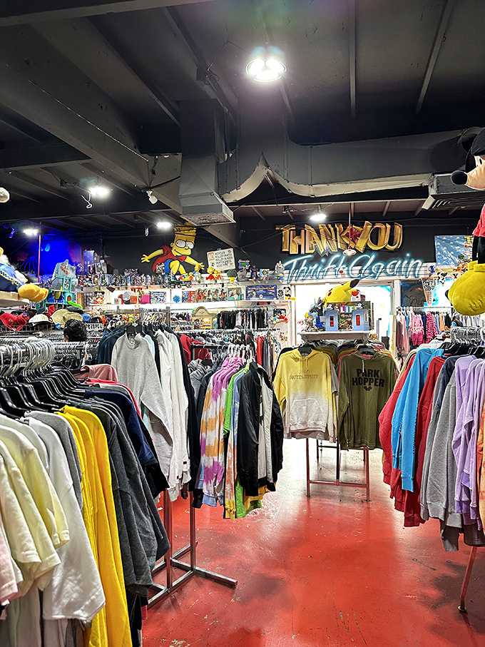 A treasure hunter's paradise awaits between these colorful racks, where vintage tees and hoodies stand ready for their second act of fashion magic.