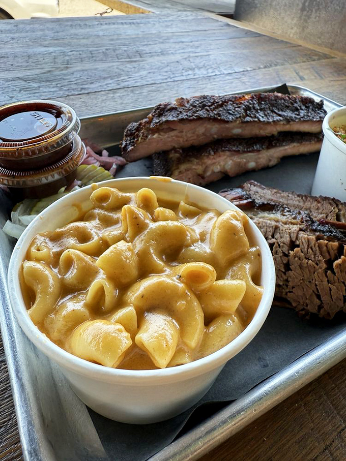 Mac and cheese that doesn't know it's a side dish. This creamy masterpiece demands equal billing with the smoked meats.
