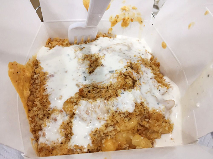 Mac and cheese gets the royal treatment with a golden crown of buttery crumbs and a creamy sauce that clings lovingly to every noodle.