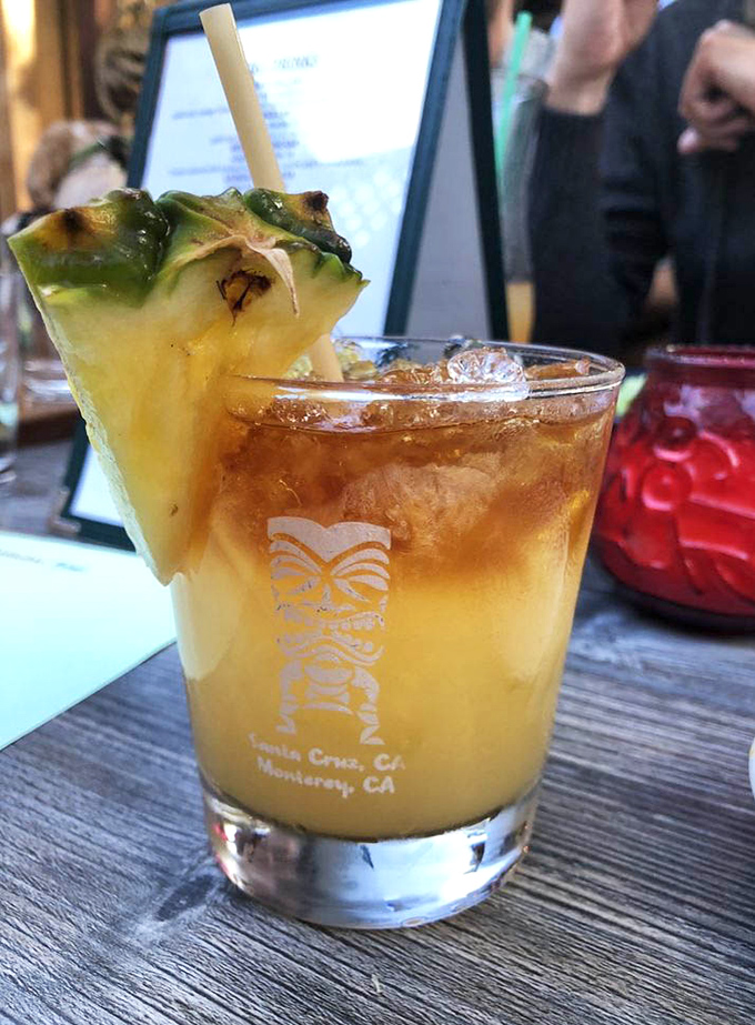 Their Mai Tai comes with a proper pineapple garnish and tiki glass—proof that some cocktails are actually meant to be photographed before drinking.