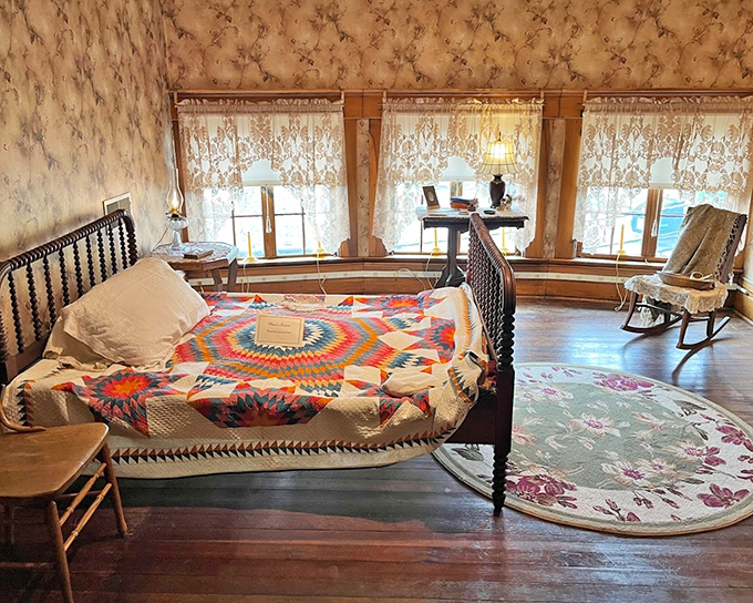 A bedroom that whispers tales of simpler times &ndash; when a colorful quilt and rocking chair constituted the ultimate luxury streaming package.