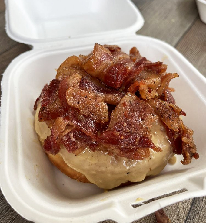 The maple bacon donut &ndash; where breakfast's greatest hits collaborate on one perfect stage. Sweet meets savory in perfect harmony.