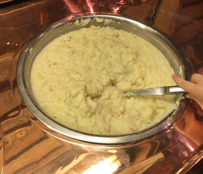 Mashed potatoes so creamy, they could negotiate peace treaties between your diet and your appetite.