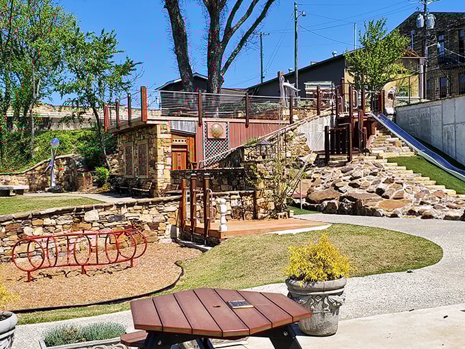 Maxfield Park's terraced design turns a simple playground visit into a multi-level adventure that won't drain your retirement fund.