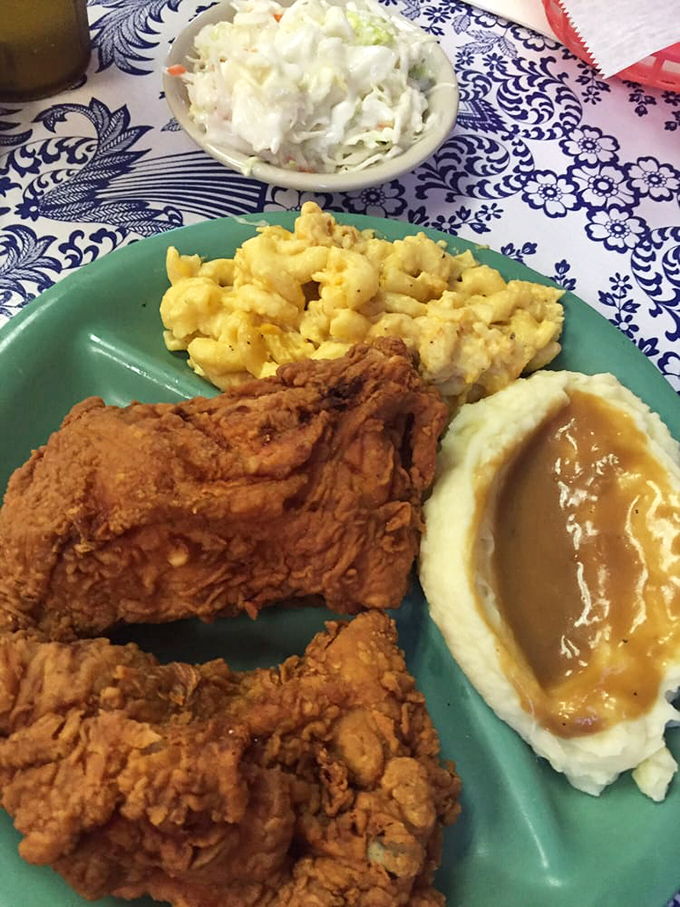 The holy trinity of Southern comfort: fried chicken, mac and cheese, and mashed potatoes with gravy. Diet plans, consider yourselves postponed.