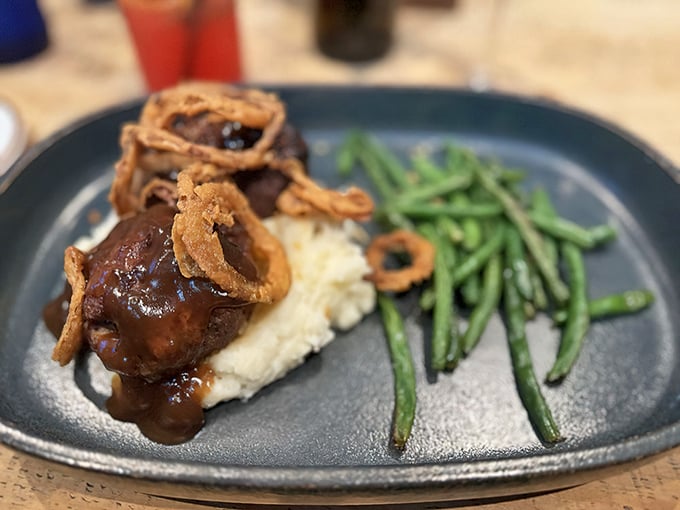 This isn't your mother's meatloaf&mdash;unless your mother was secretly a gourmet chef. Those crispy onion strings are the crown jewels of comfort food. 