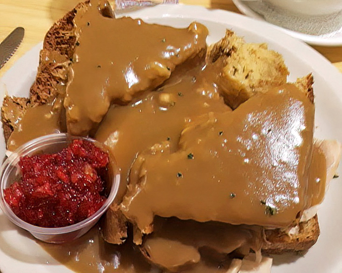 The hot meatloaf sandwich&mdash;where gravy flows like a savory waterfall over hearty bread. A meal that hugs you from the inside out.