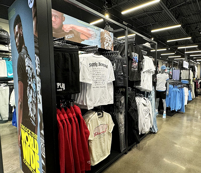 The streetwear section beckons with graphic tees and urban style. Even the mannequins seem cooler than most of us.