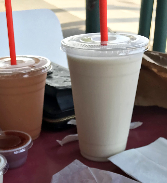Chocolate and vanilla shakes so thick they qualify as both beverage and upper body workout. The straw is merely a suggestion.