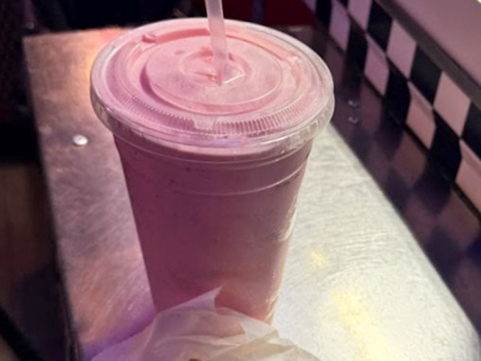 This isn't just a milkshake; it's a creamy commitment that requires serious bicep strength to sip through a straw. Worth every calorie-laden slurp.