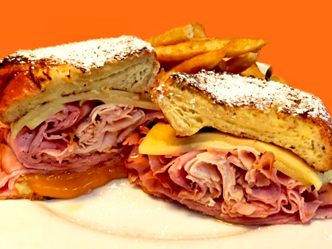 Monte Cristo sandwich so perfectly executed it deserves its own Broadway show. The powdered sugar is just showing off at this point.