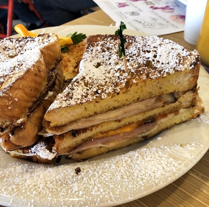 This Monte Cristo sandwich isn't just breakfast&mdash;it's dessert masquerading as a morning meal, complete with powdered sugar disguise.