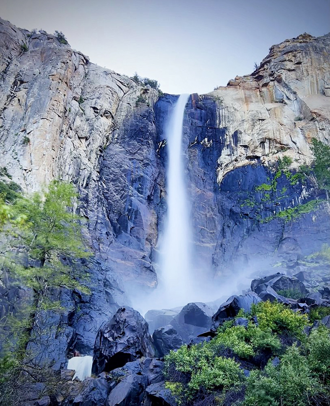 The original skyscraper: Bridalveil's waters plunge dramatically against ancient blue-gray granite walls that make Manhattan's buildings seem like temporary arrangements.
