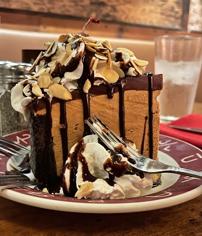 The mud pie at Pioneer Saloon doesn't just satisfy your sweet tooth – it throws a full-blown dessert carnival for your taste buds.