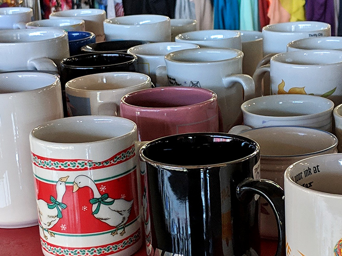 The mug collection where your future favorite coffee companion waits patiently among its ceramic siblings.