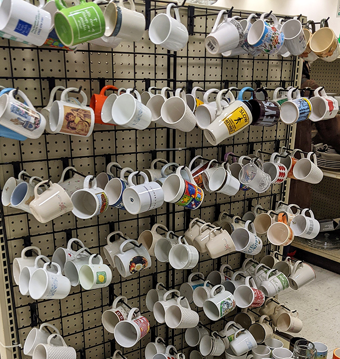 The mug wall&mdash;where coffee vessels of vacations past, corporate events, and novelty gifts find new morning routines. Someone's souvenir is about to become your favorite cup.
