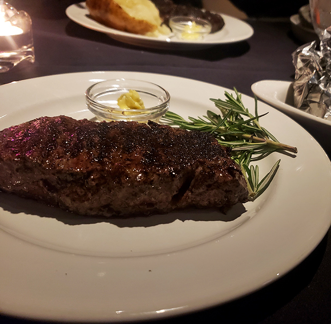 This New York Strip arrives with a sprig of rosemary standing guard, as if to say, "Yes, I'm worth every penny and every mile you drove."