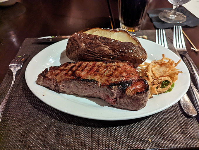 This New York strip doesn't need a Broadway show to be a star. Perfectly seared, it shares the plate with a loaded baked potato that's equally deserving of applause.