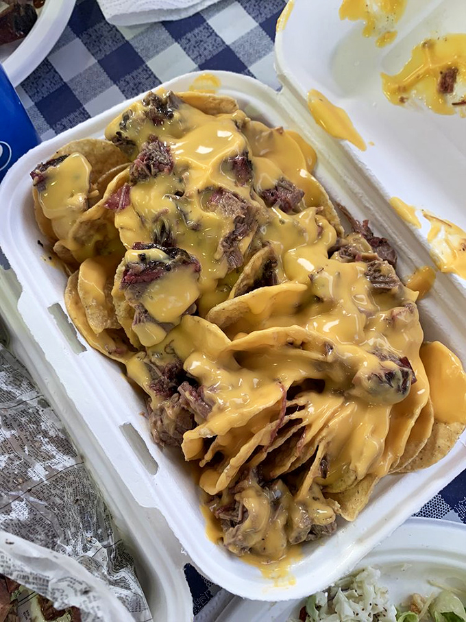 Nachos piled so high with meat and cheese, you'll need a strategy and possibly reinforcements.