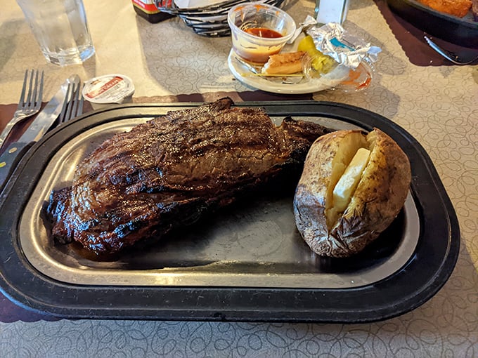 A steak so perfectly grilled it deserves its own Instagram account. That baked potato isn't just a side&mdash;it's a co-star.