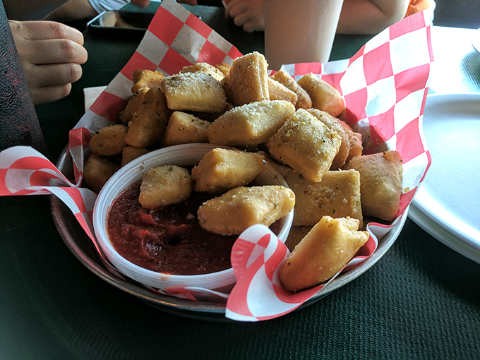These aren't just nuggets; they're golden pillows of dough perfection, ready for their marinara bath before making the journey to flavor town.