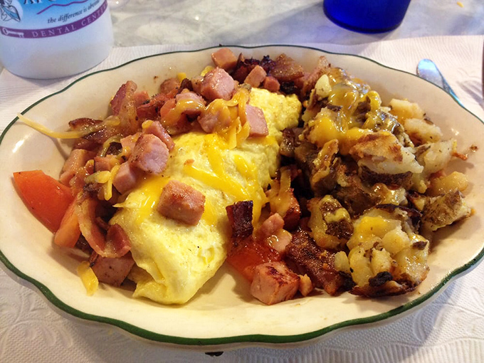 An omelet that doesn't just feed you&mdash;it embraces you. The ham and cheese ratio here deserves its own mathematical theorem.