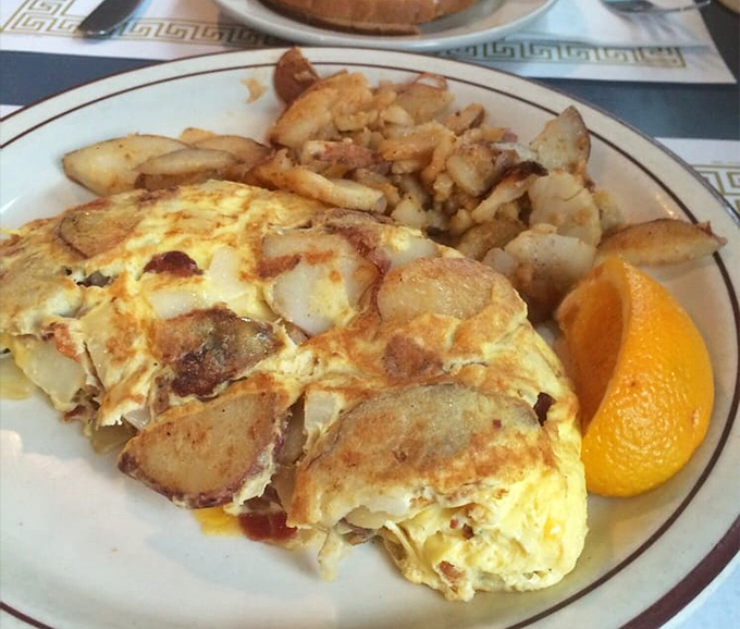 This omelet doesn't need fancy European cheese or truffle oil&mdash;just perfectly cooked eggs embracing potatoes in a breakfast hug that feels like home.