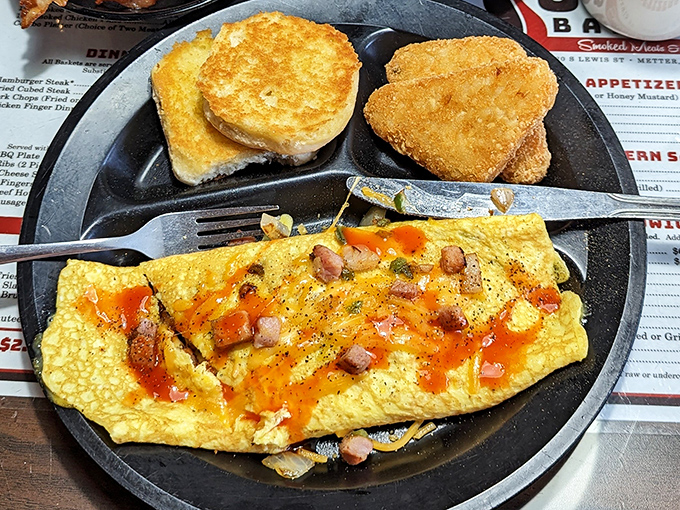 Breakfast at a BBQ joint? This omelet stuffed with smoky goodness proves Jomax doesn't just do lunch right &ndash; they understand morning hunger too.