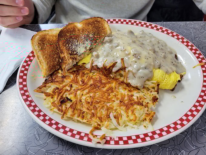 Crispy hashbrowns that shatter like glass, eggs cooked to perfection, and gravy that would make your grandmother nod in approval.