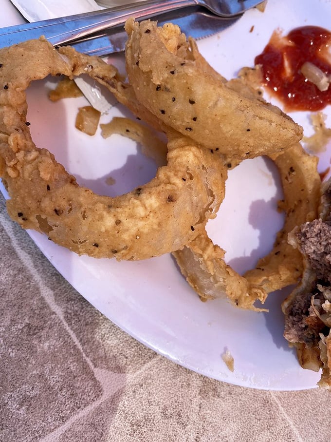These onion rings aren't just fried&mdash;they're golden halos of crunch that make you wonder why vegetables ever bothered growing any other way.