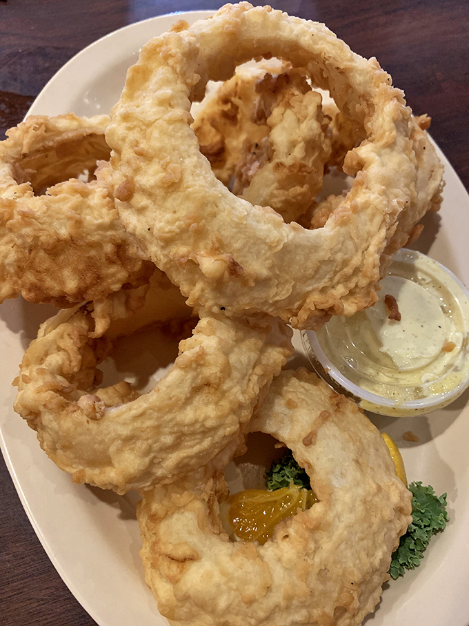Golden-fried onion rings that crunch like autumn leaves&mdash;except these leaves make you say "mmm" instead of "time to rake."