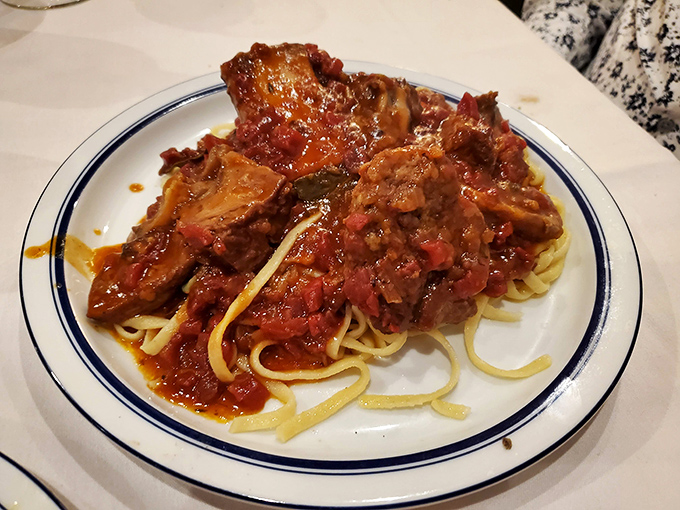 When pasta meets slow-cooked beef in tomato sauce, time slows down. Each forkful of this osso bucco is a tiny celebration on linguine.