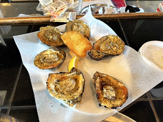 These aren't just oysters; they're briny time machines that transport you straight to the coast with each perfectly fried morsel.