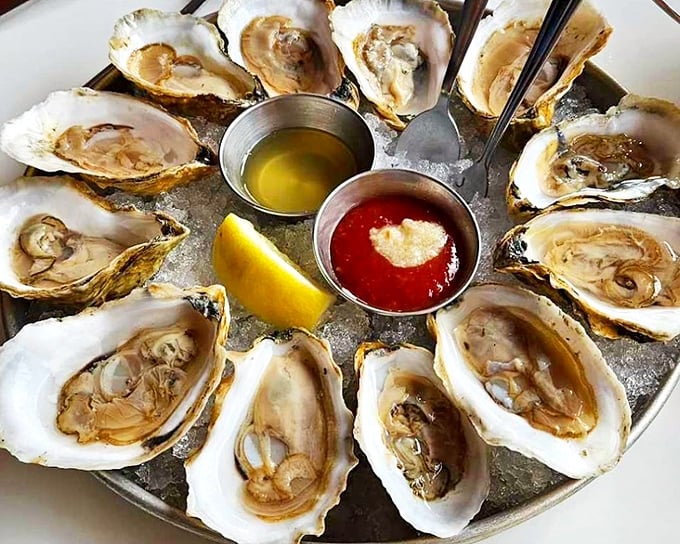The ocean's perfect appetizer, arranged like edible jewelry. These oysters are so fresh they practically wink at you from their icy bed.
