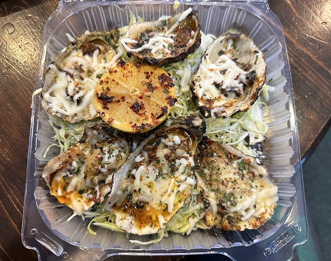 These charbroiled oysters, kissed by flame and topped with cheese, are what would happen if the ocean and a pizzeria had a delicious love child.