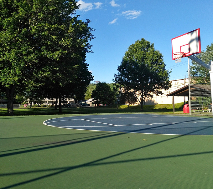 This basketball court isn't just asphalt and hoops&mdash;it's where local legends are born and where kids still choose actual games over virtual ones.
