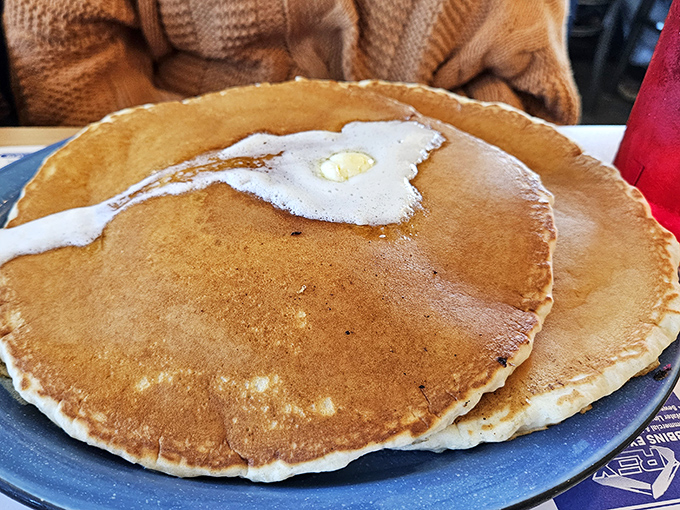 These pancakes are so perfectly golden and massive they deserve their own landing strip. Butter, prepare for touchdown!
