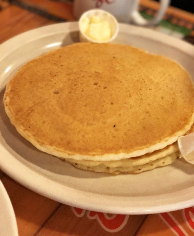 These pancakes aren't just breakfast, they're edible sunshine&mdash;perfectly golden discs stacked high, awaiting their maple syrup baptism.