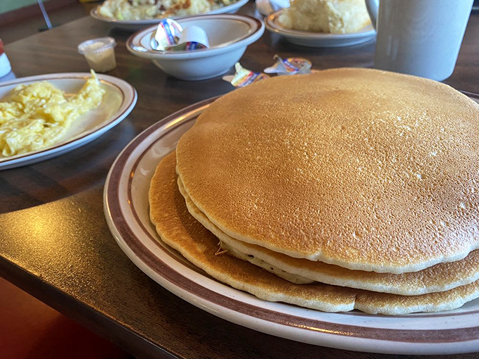 Pancakes stacked higher than LA rent prices, golden-brown and fluffy enough to make you forget about that diet you were considering.
