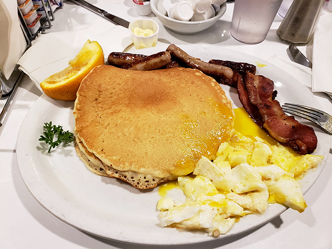 Pancakes so perfectly golden they make you wonder if the griddle has been seasoned with decades of breakfast happiness and morning conversations.