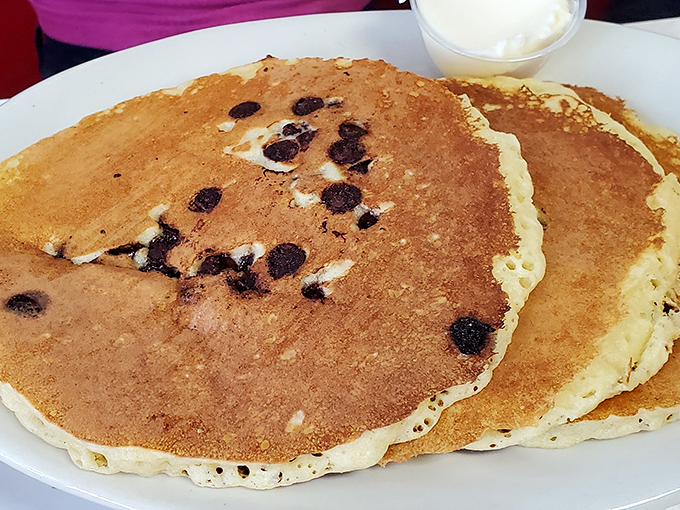 These chocolate chip pancakes aren't just breakfast, they're an engineering marvel &ndash; managing to be both fluffy and substantial. The breakfast equivalent of a weighted blanket.
