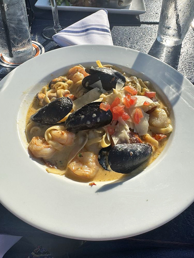 Seafood pasta that looks like Neptune himself catered your meal&mdash;mussels, shrimp, and pasta dancing in a creamy sea of deliciousness.
