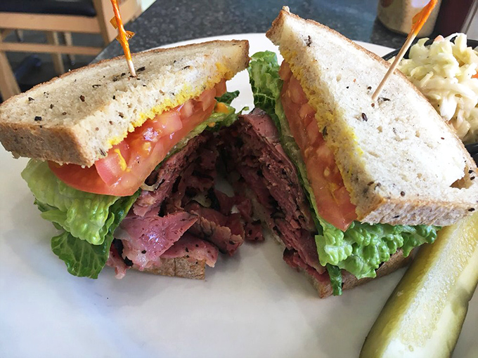 Pastrami so pink and perfect it could make a New Yorker weep with joy. The pickle stands guard, knowing it's only a matter of time.
