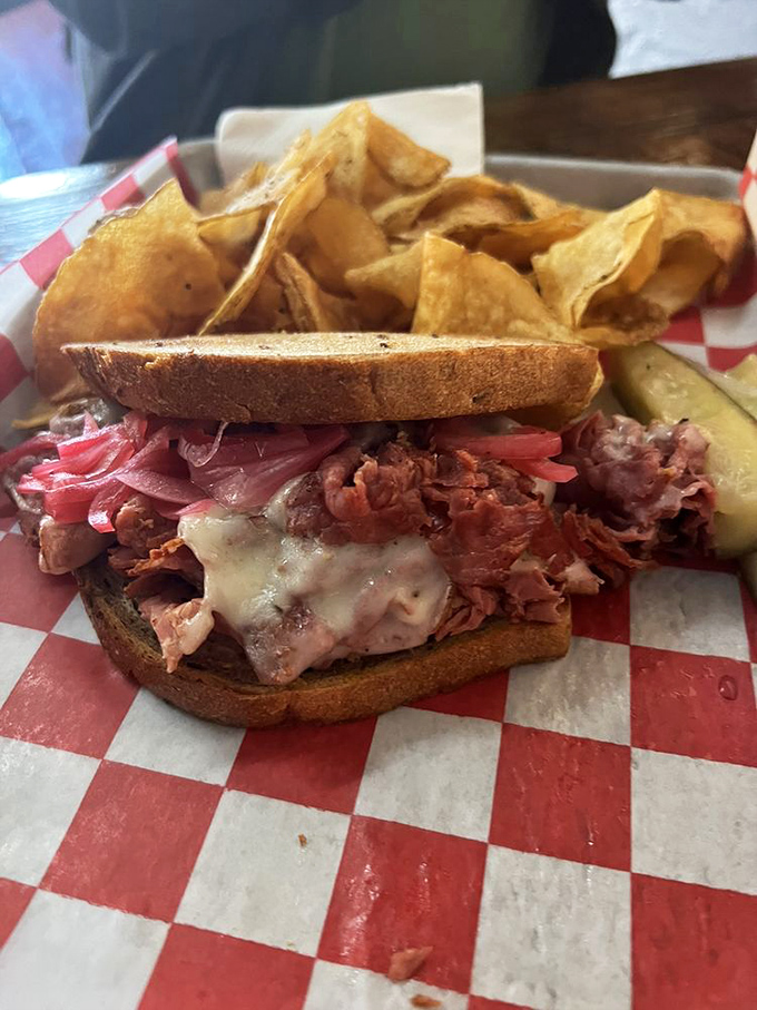 This isn't just a sandwich; it's a pastrami masterpiece. Tender meat, melted cheese, and pickles create the holy trinity of deli perfection.