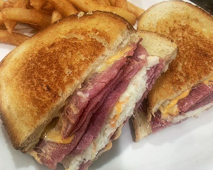 This Reuben sandwich isn't just stacked&mdash;it's architected. Layers of corned beef and sauerkraut creating the skyscraper of sandwich dreams.